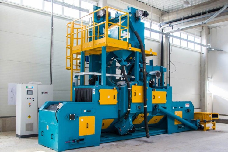 Shot blasting machine with wire mesh belt conveyor CWB OMSG